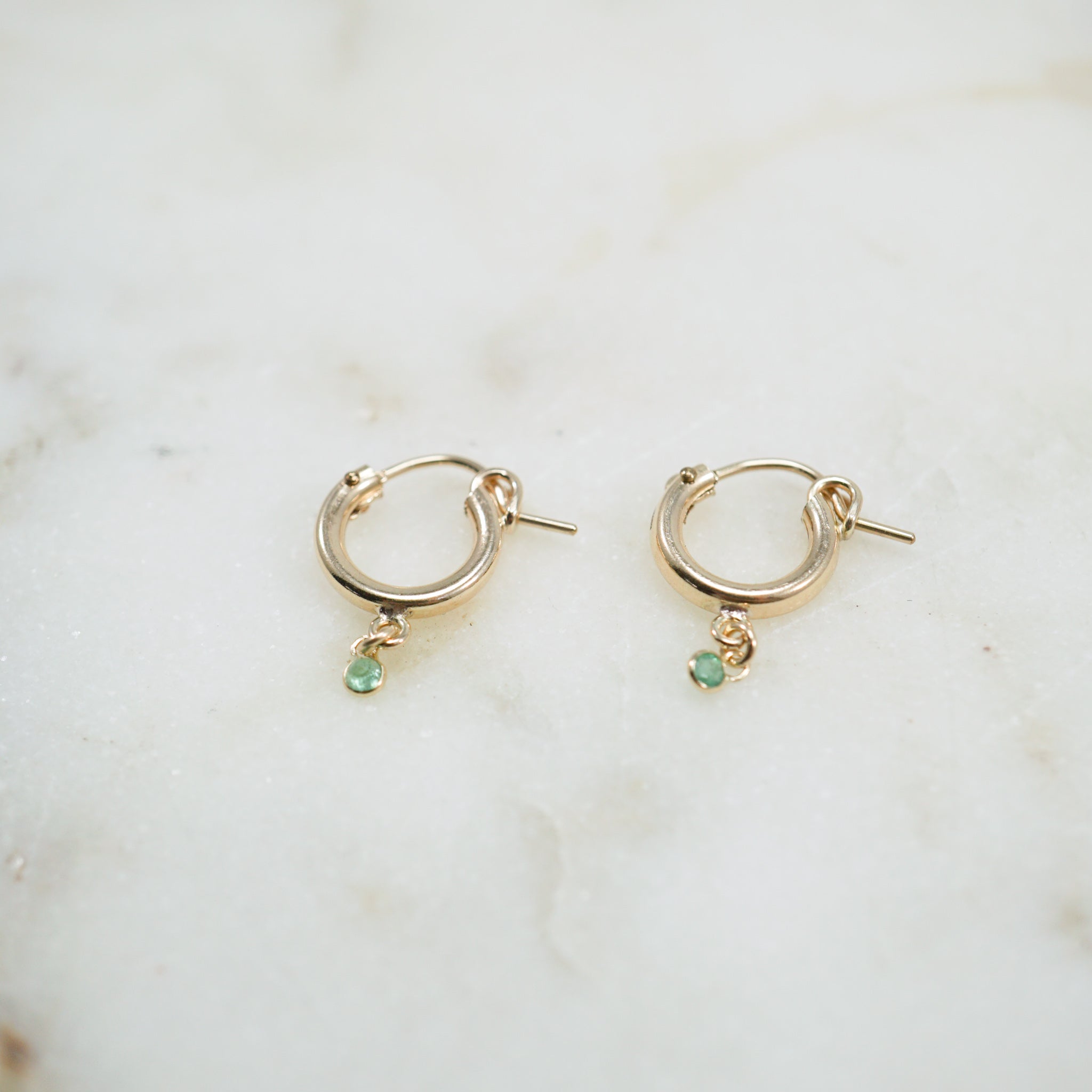Flex Emerald Hoops – JoeLuc